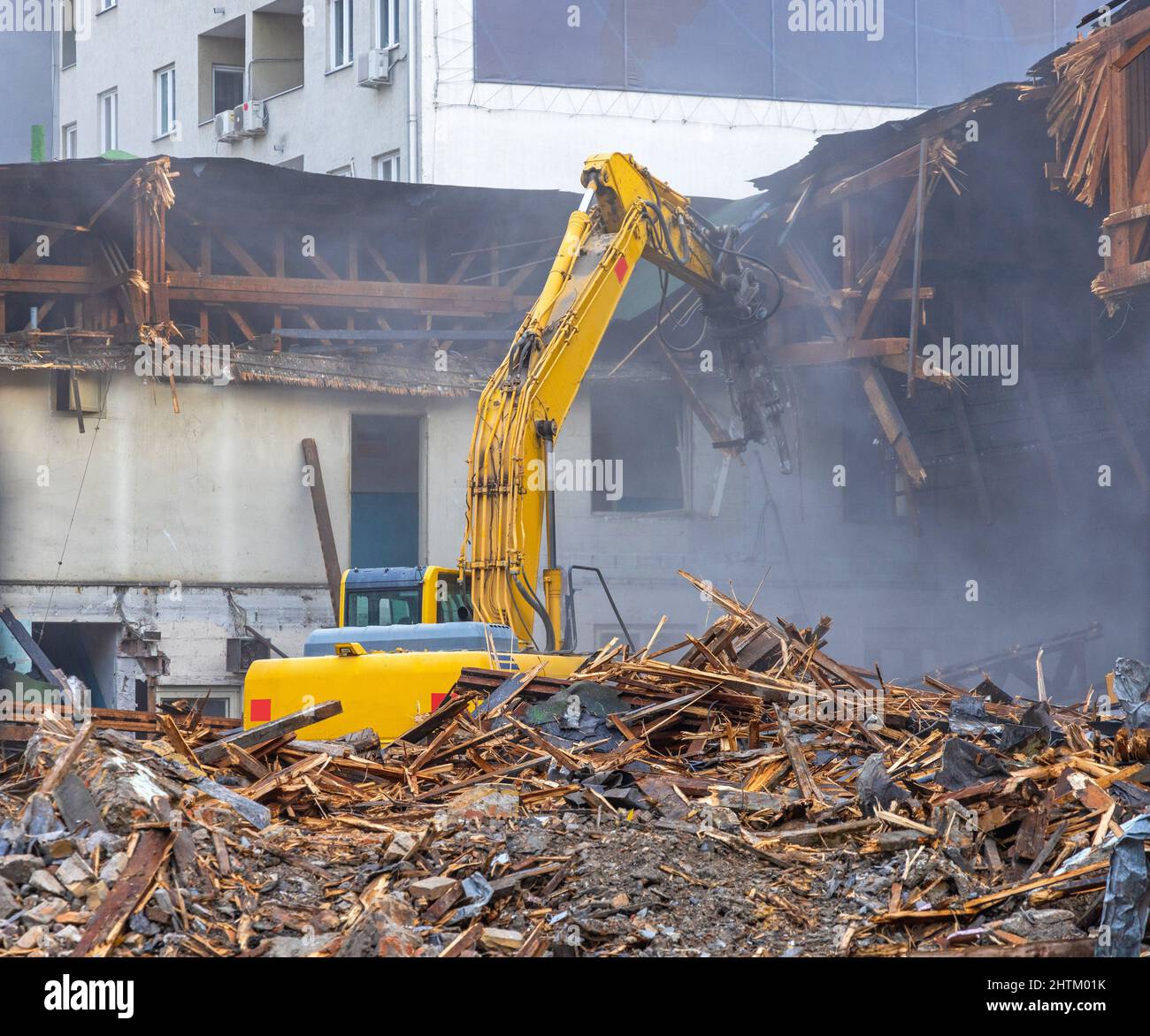 Machine Under Debris at Demolition Site Building Deconstruction Stock ...