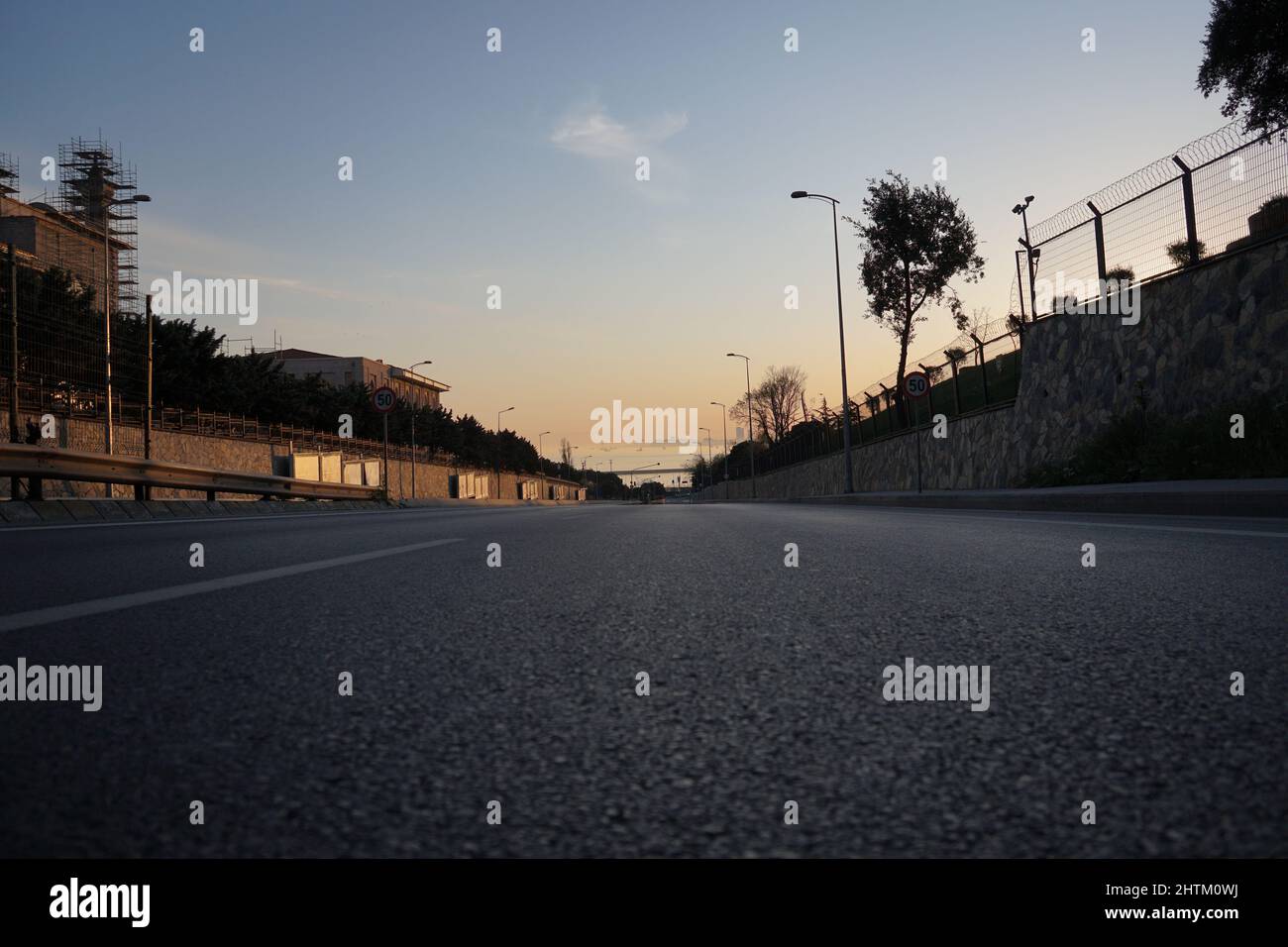 Empty city , road and sunset Stock Photo - Alamy