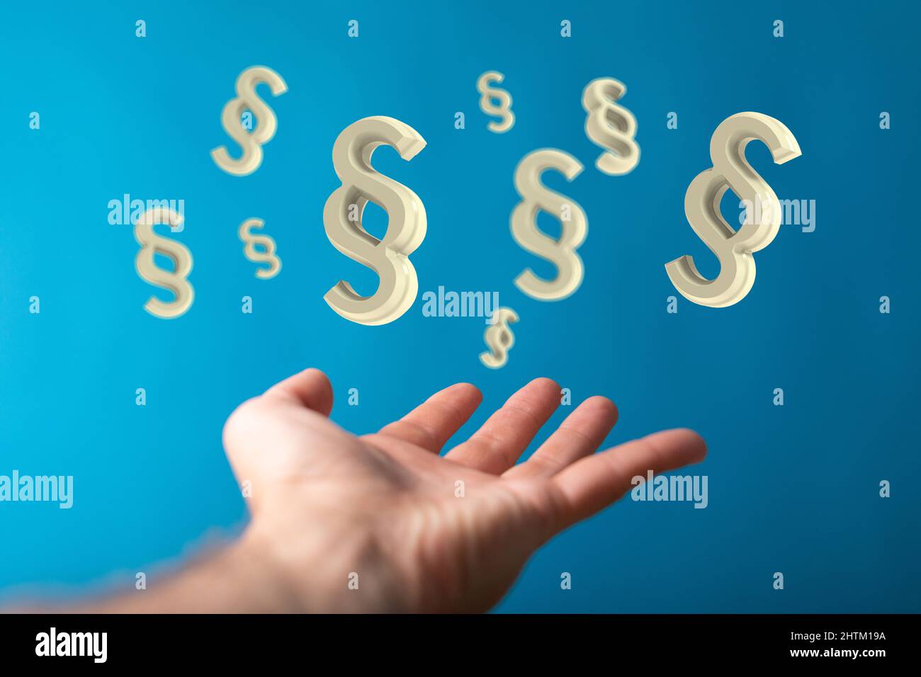 Hand holding 3D rendering law signs Stock Photo - Alamy