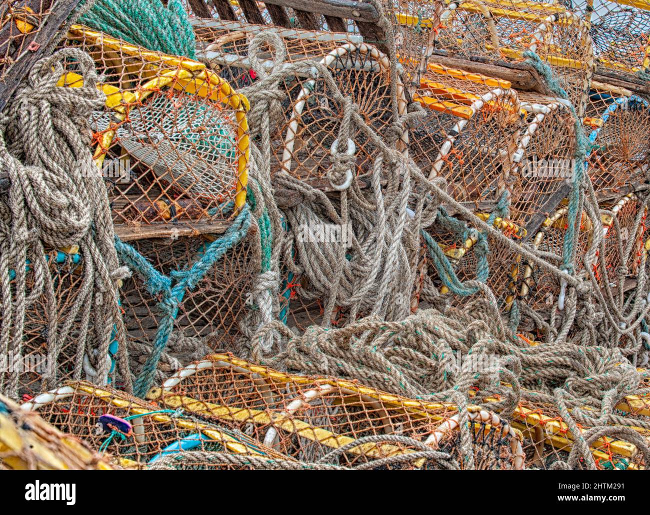 Patterns created by a stack of lobster pots on the quayside Stock Photo ...