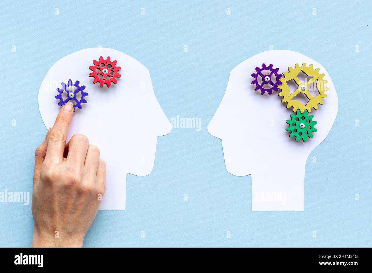 Brain gears on two human heads. Mind work. Brain chaos and mind peace ...