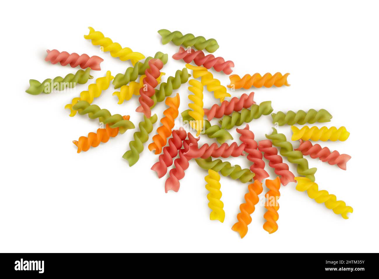 raw Fusilli colored pasta, isolated on white background with clipping ...