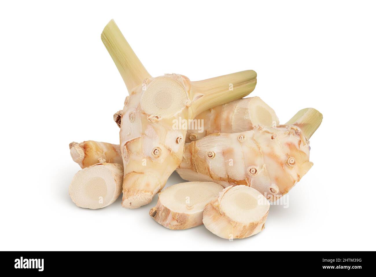Fresh galangal root with slices isolated on white background with ...