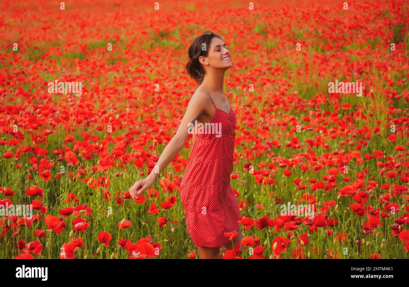 Carefree woman in poppy flower field. Wildflowers botanical plant ...