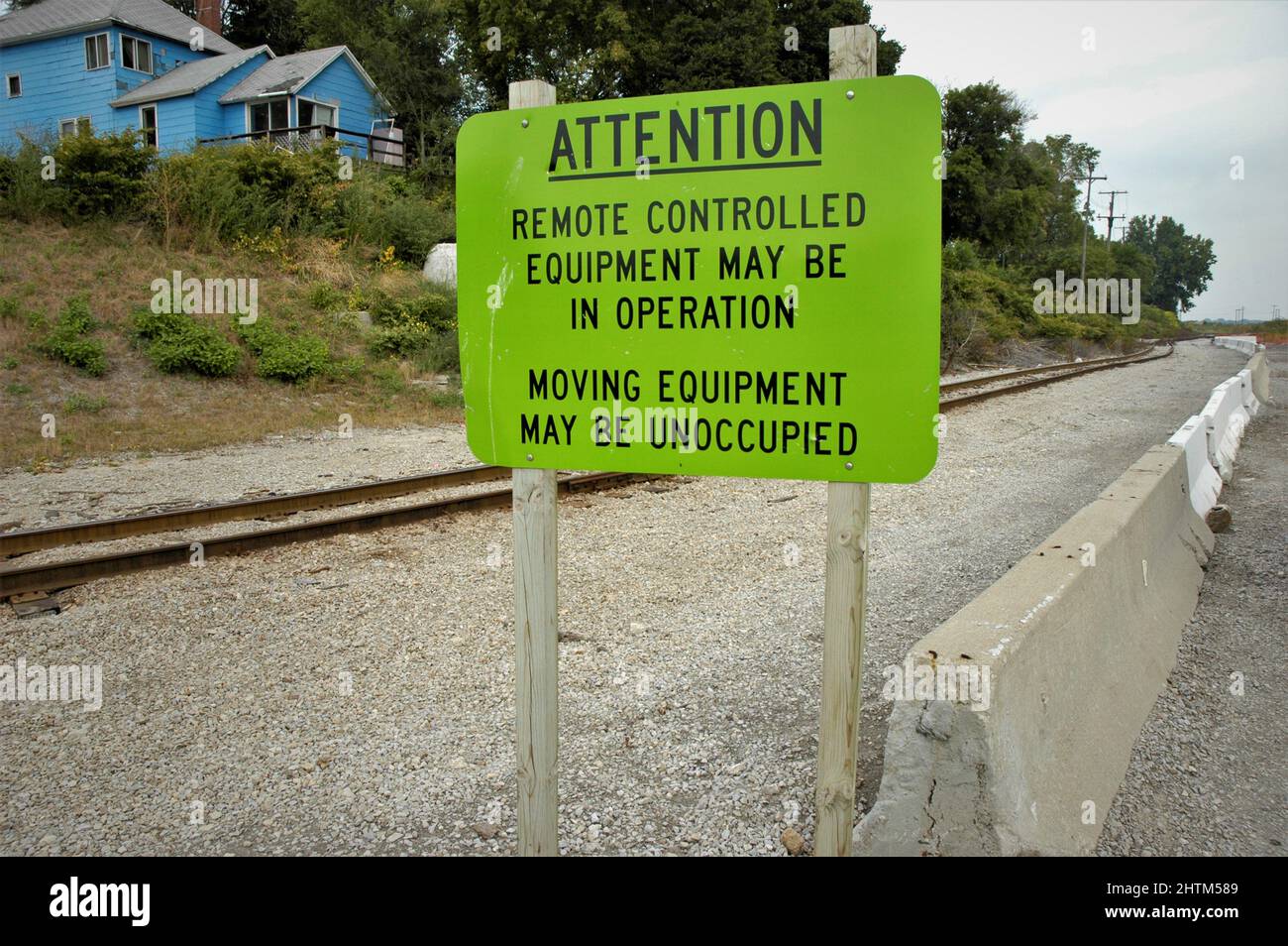 Warning sign at train crossing where there are no lights or guards ...