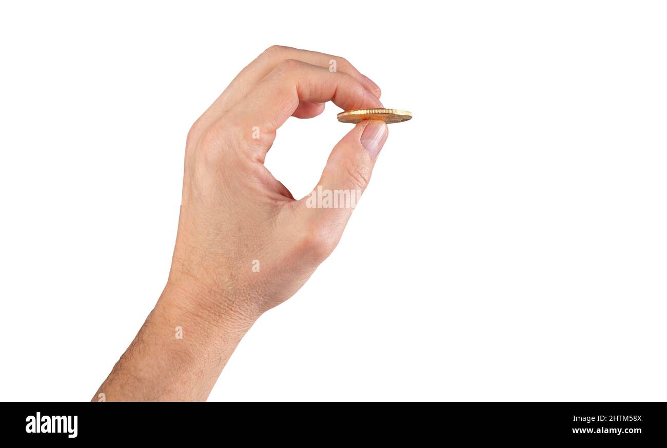 Hand holding coin isolated on white background. Money and finance ...