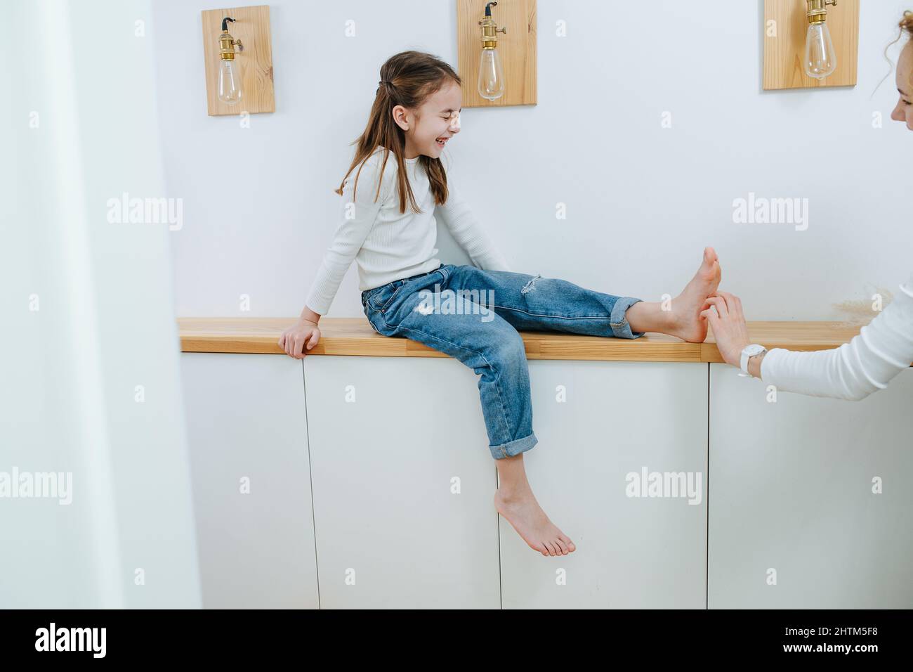 Tickled feet hi-res stock photography and images - Alamy