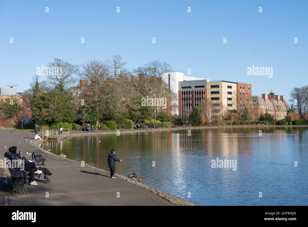 The boating lake at Leazes Park, Newcastle upon Tyne, UK, with the ...