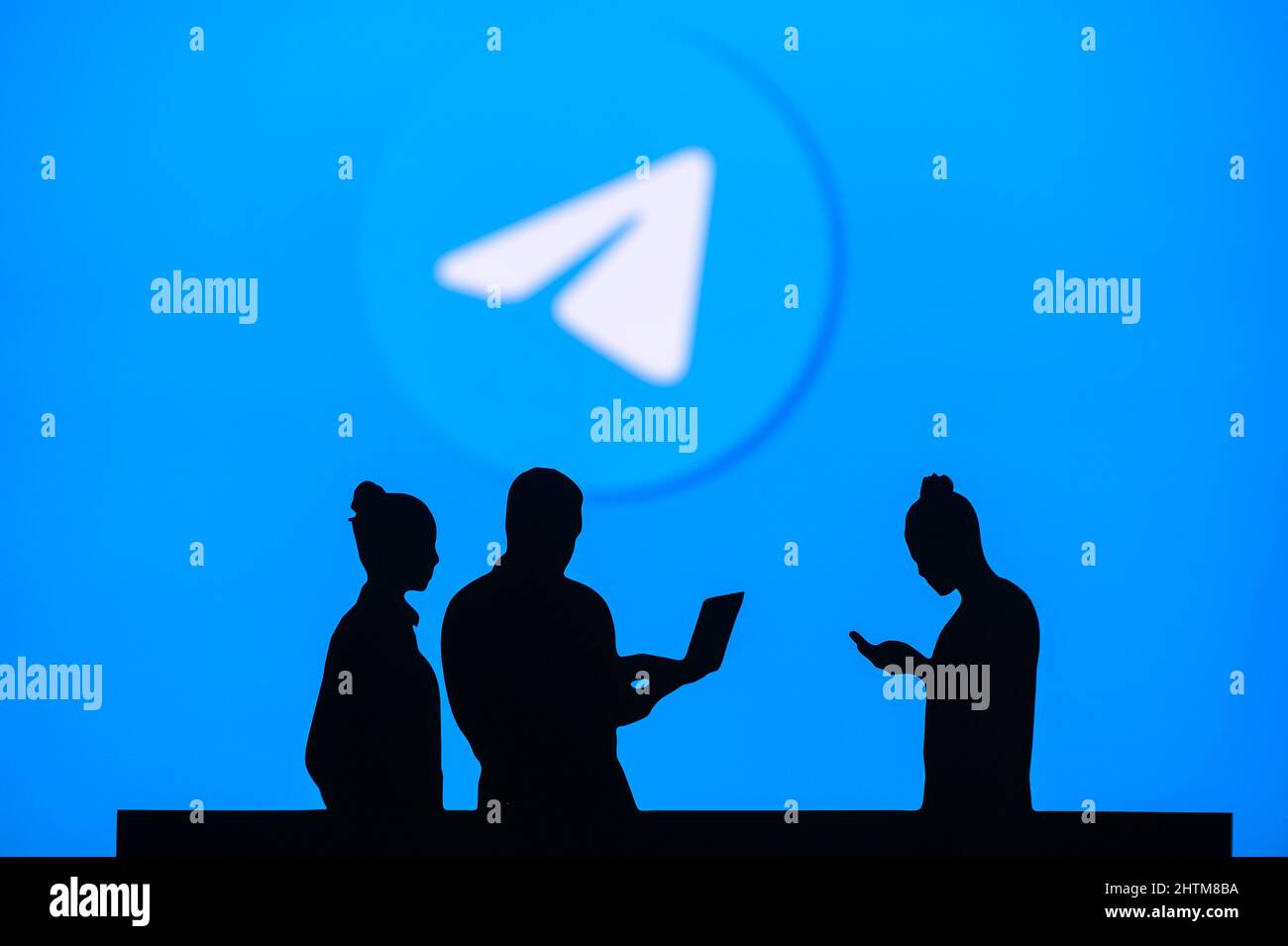 NEW YORK, USA, 1. MARCH 2022: Telegram app, Group of business people ...