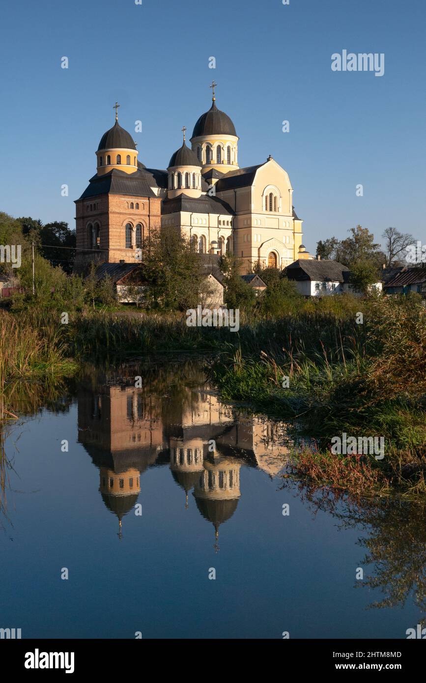 Beautiful view of a church and its reflection on a water Stock Photo ...
