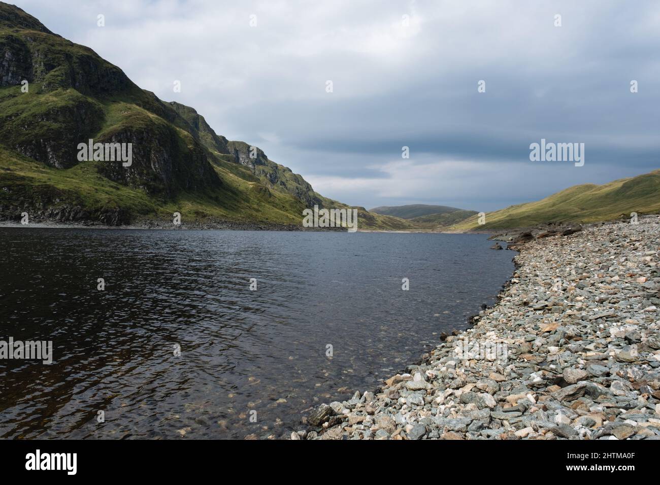 A view over Lochan na Lairige with the mountain ridges above, in the ...