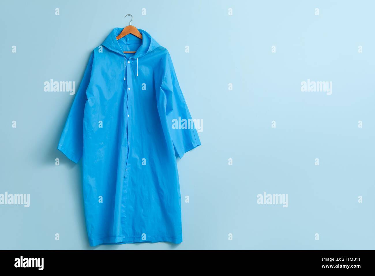 Wet coat hanging hi-res stock photography and images - Alamy