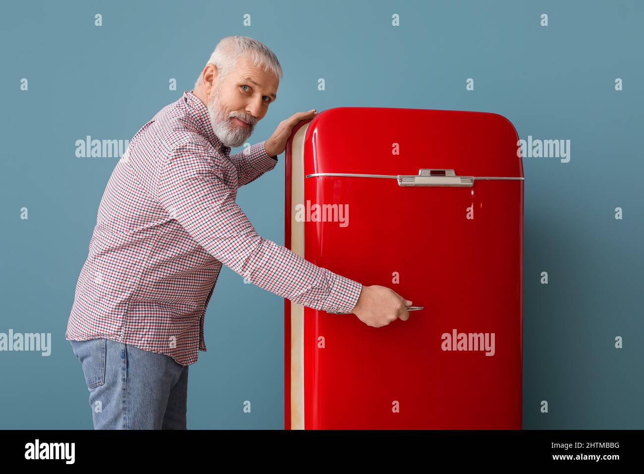 Man opening fridge hi-res stock photography and images - Alamy