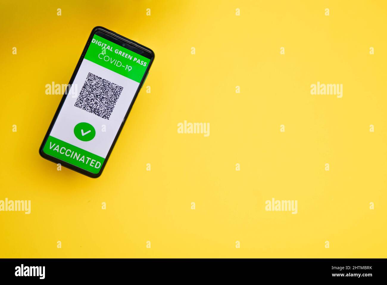 Greenpass digital covid certificate vaccinated Stock Photo - Alamy