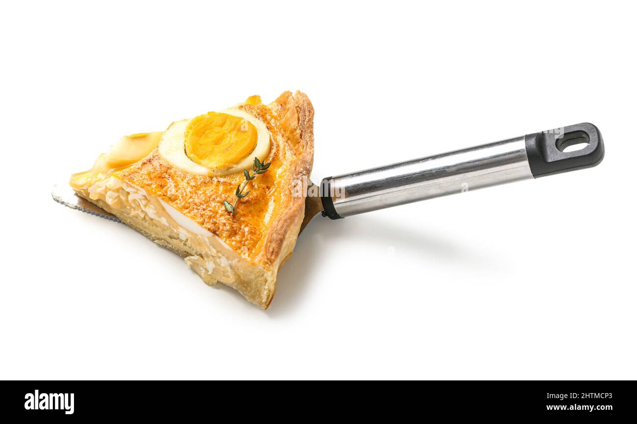 Spatula with piece of tasty Easter tart on white background Stock Photo ...