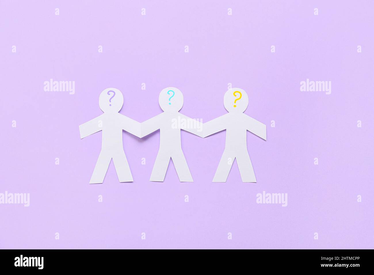 Paper human figures with question marks on lilac background. Concept of ...