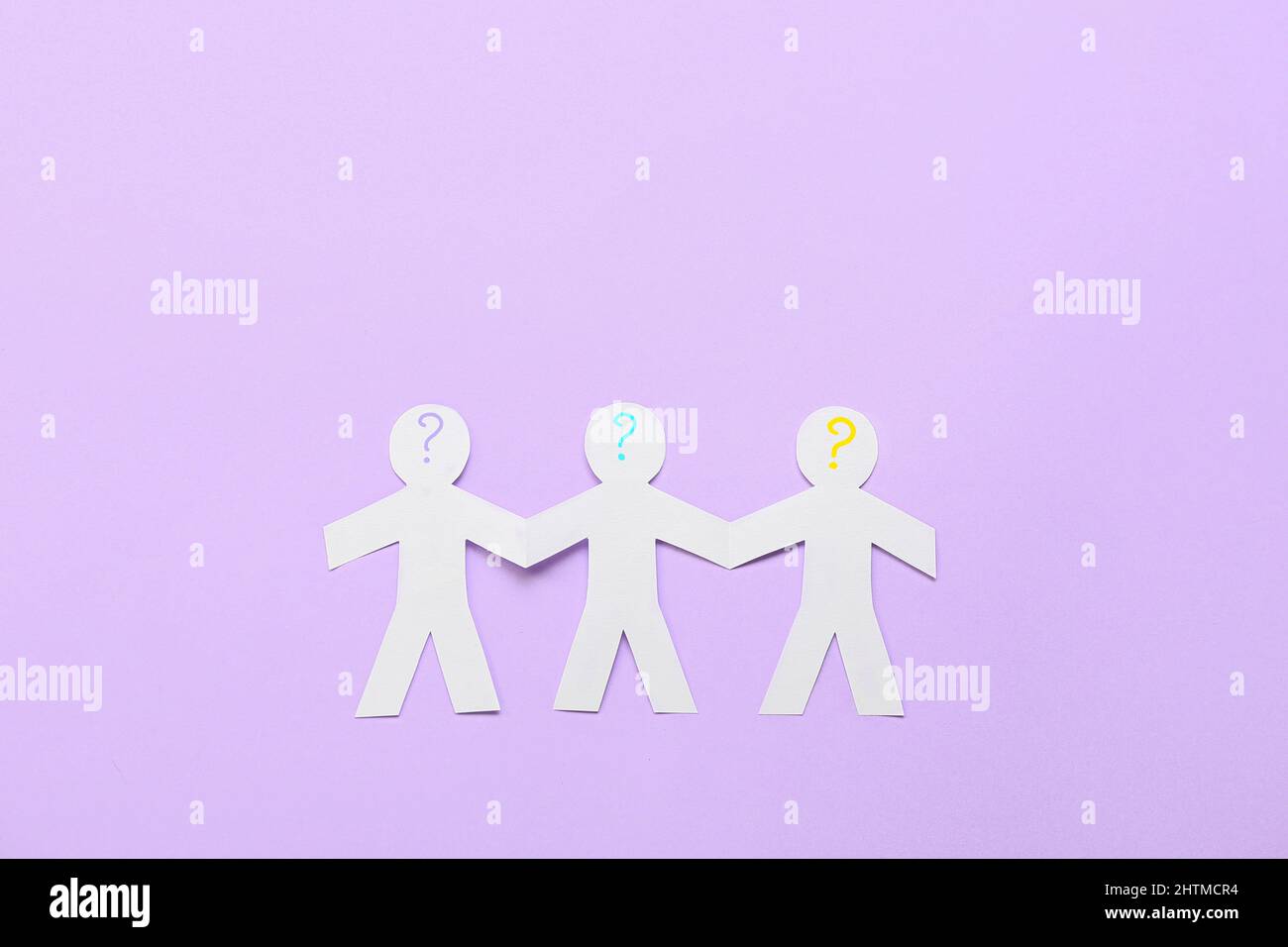 Paper human figures with question marks on lilac background. Concept of ...