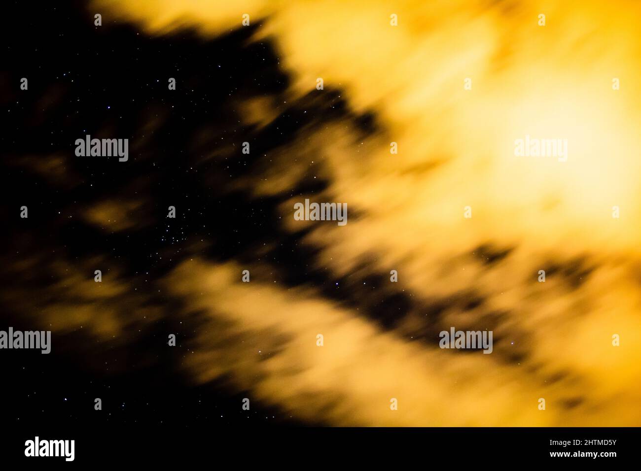 Stars in space, real photography with moving clouds Stock Photo - Alamy