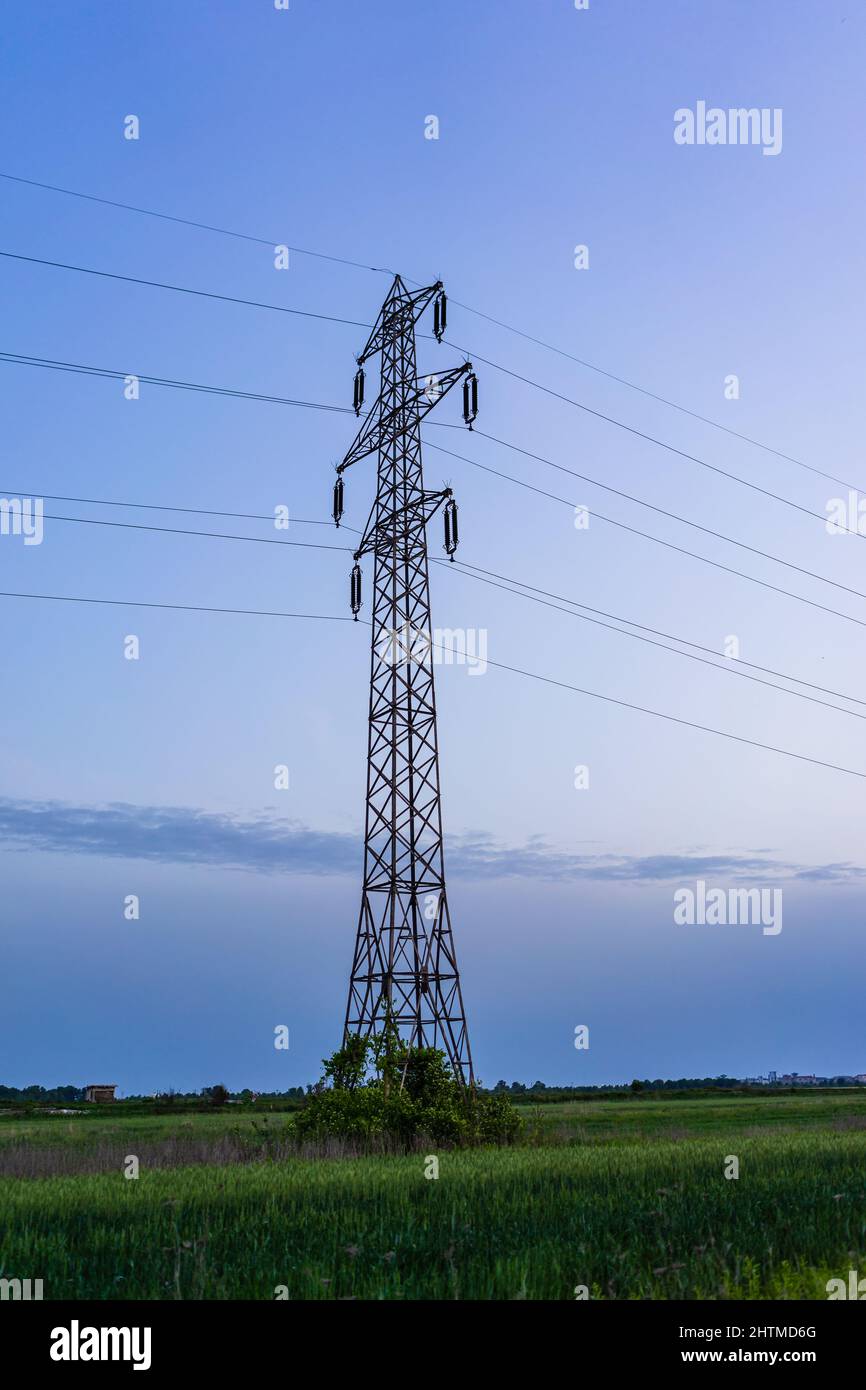 Detail of electric pole with electric cables at sunset Stock Photo - Alamy