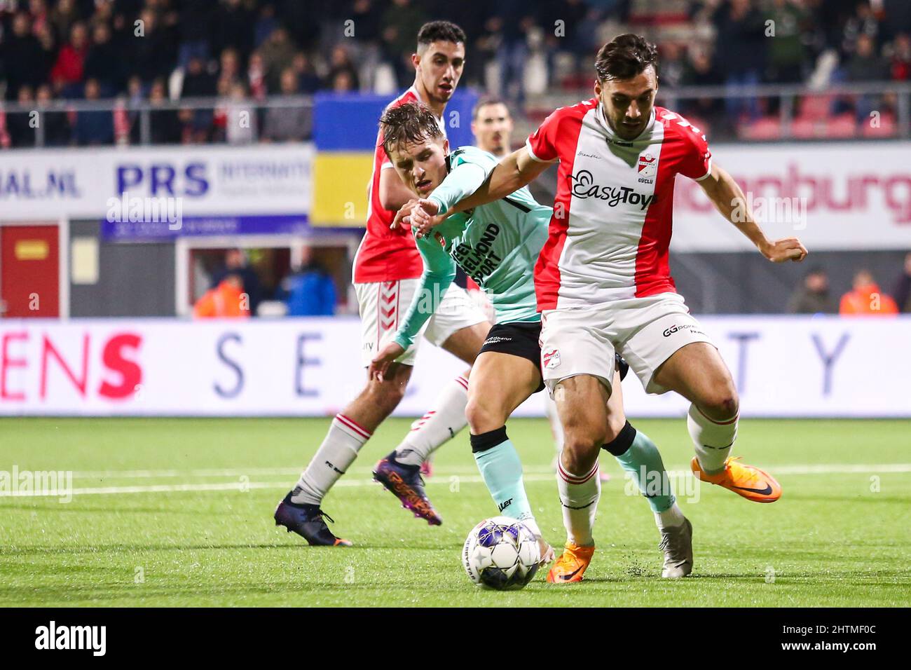 EMMEN, NETHERLANDS - MARCH 1: Dean van der Sluijs of Helmond Sport battles for the ball with ...