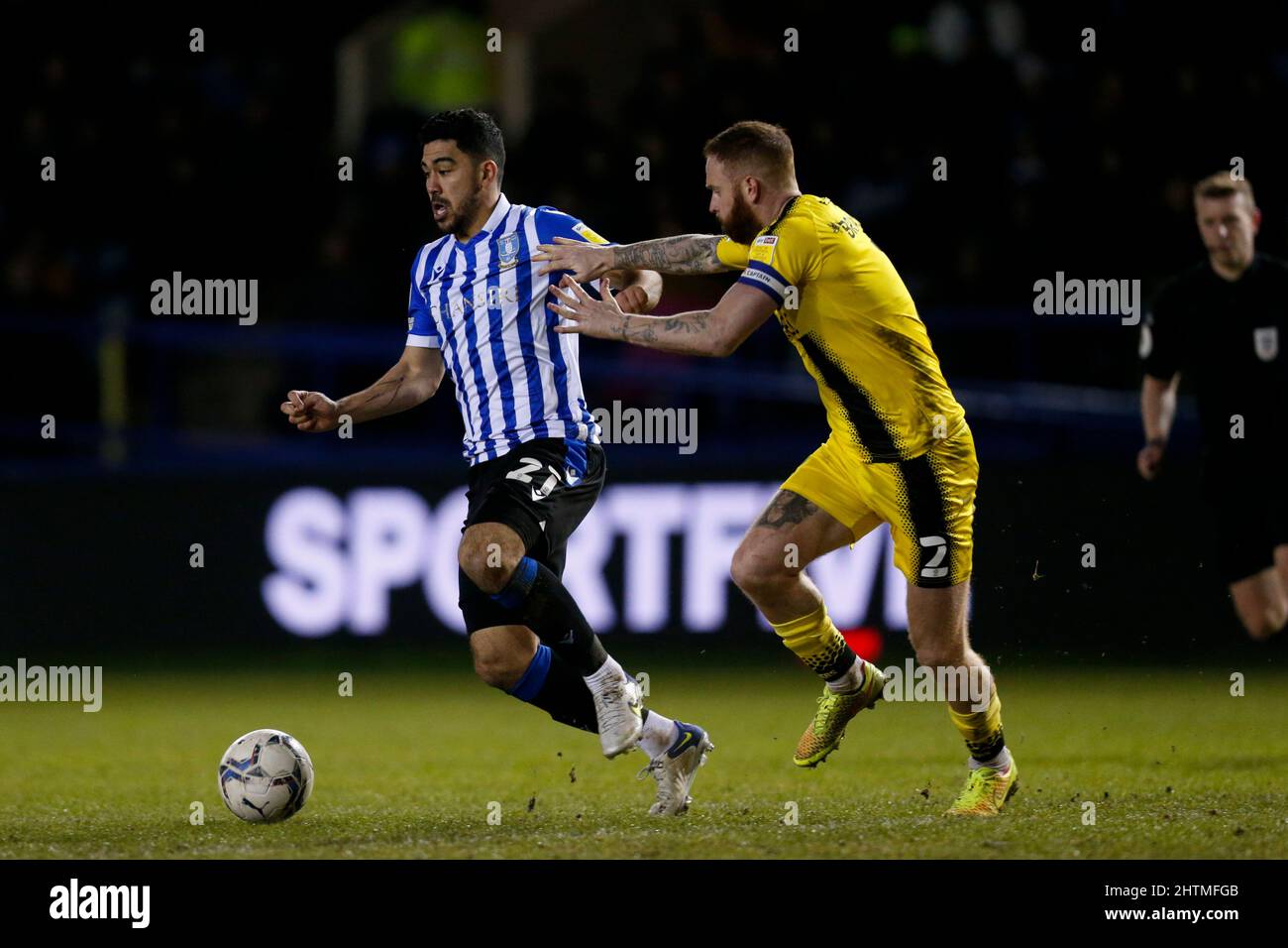 Massimo Luongo #21 of Sheffield Wednesday and John Brayford #2 of ...
