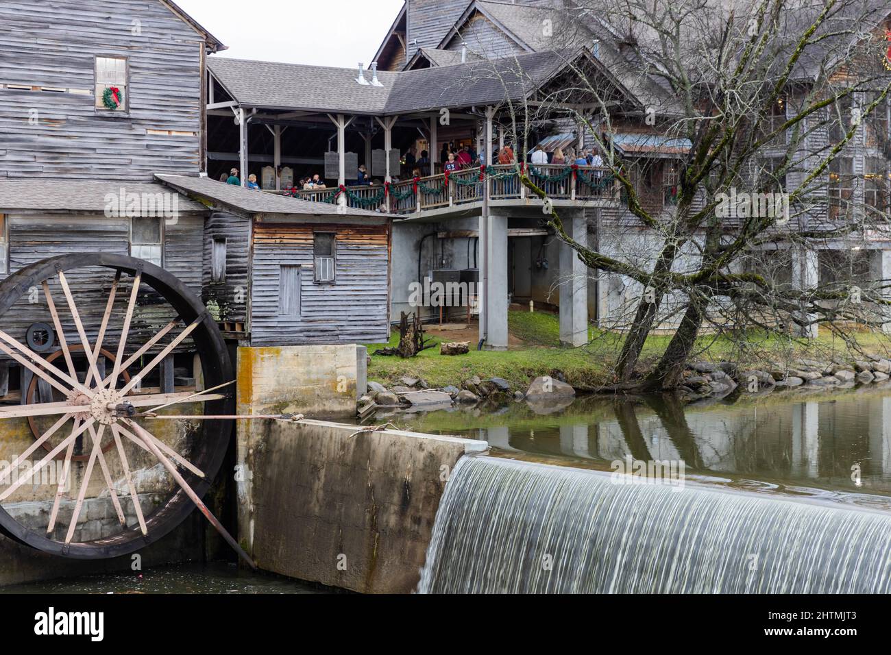 Sustainable climate visual of an old water mill by the river Stock ...