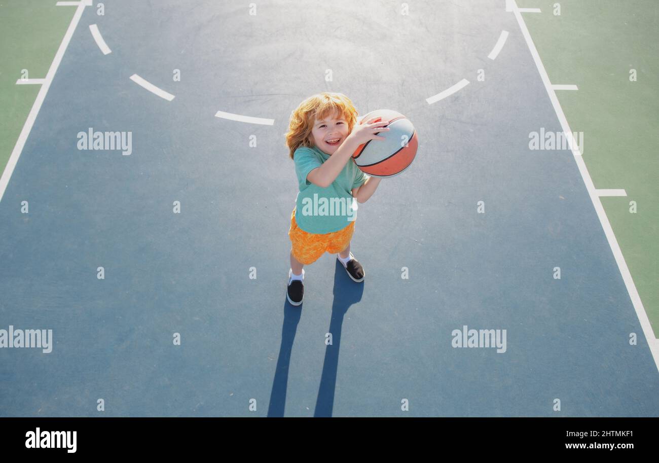 Little boy playing basketball. Child sport activity. Kids basketball ...