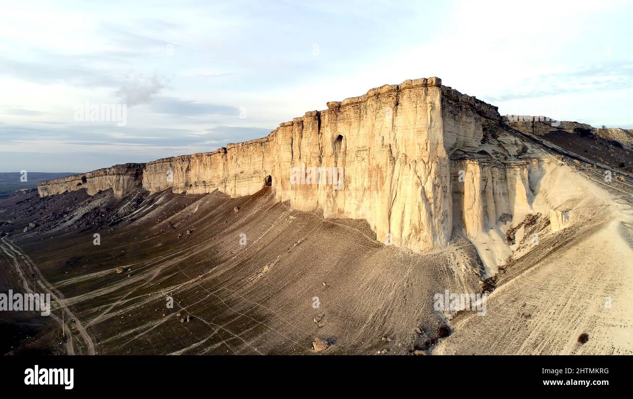 Top view of sheer cliff. Shot. Amazing panoramic view of steep white ...