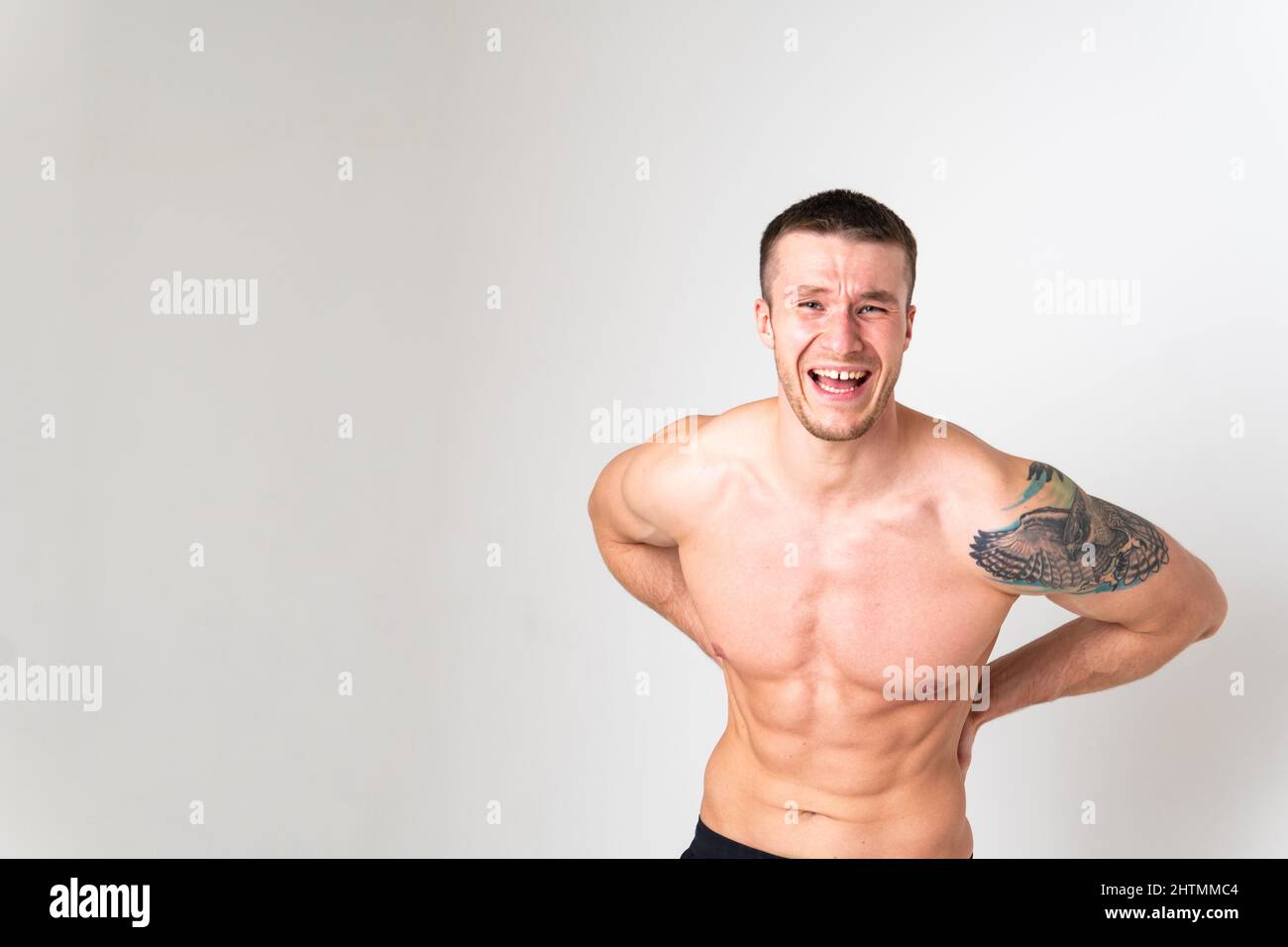 A man back pain keeps his hand on his back pain hurt muscle, person ...