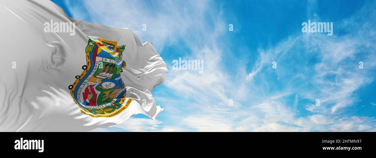 flag of Puebla , Mexico at cloudy sky background on sunset, panoramic ...