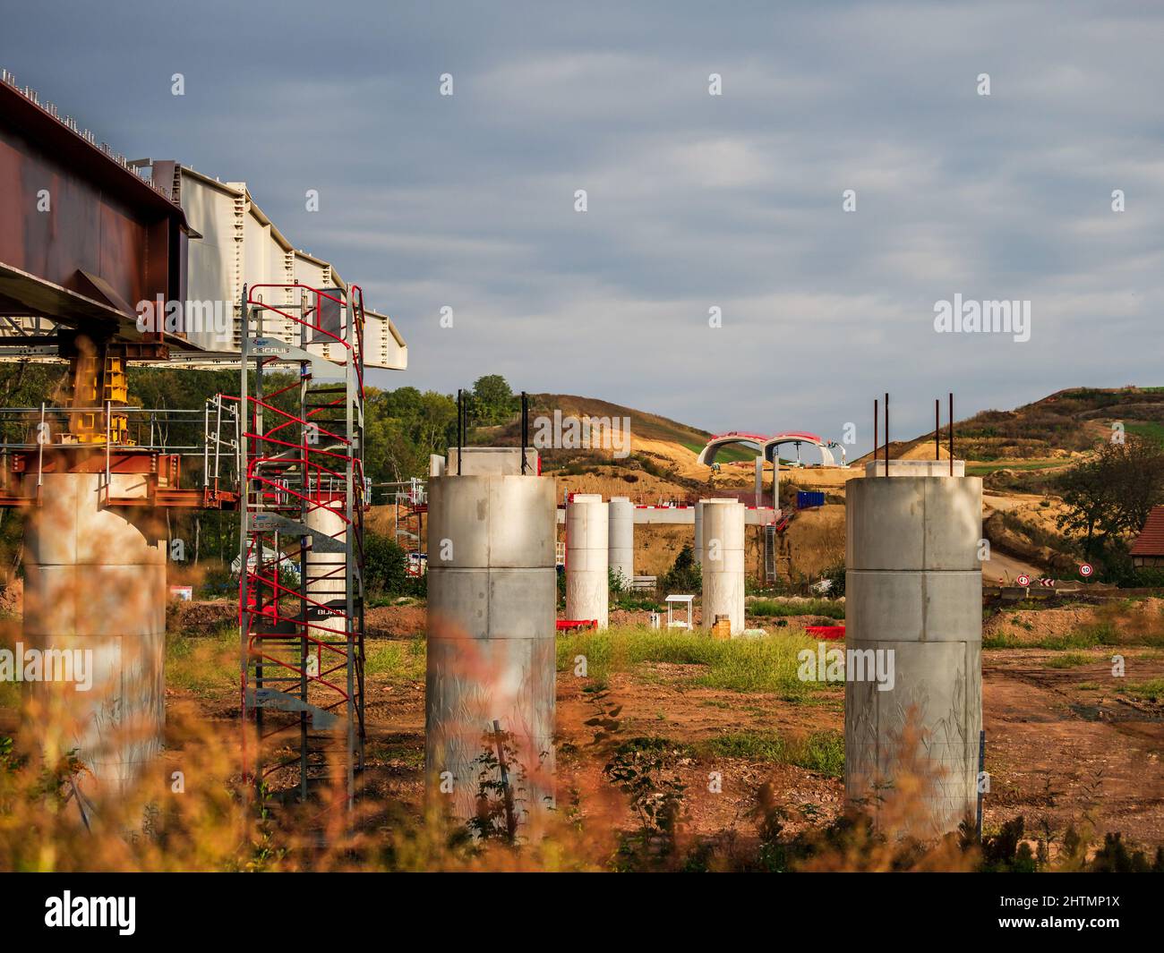 Construction of a new expressway. Bridge supports and new roadbed ...
