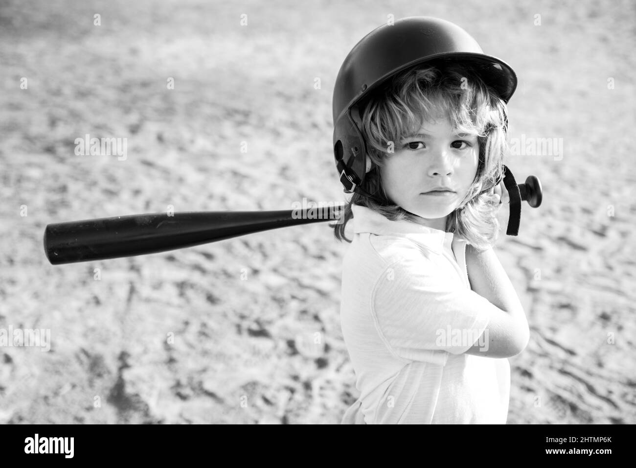 Kid holding a baseball bat. Pitcher child about to throw in youth ...
