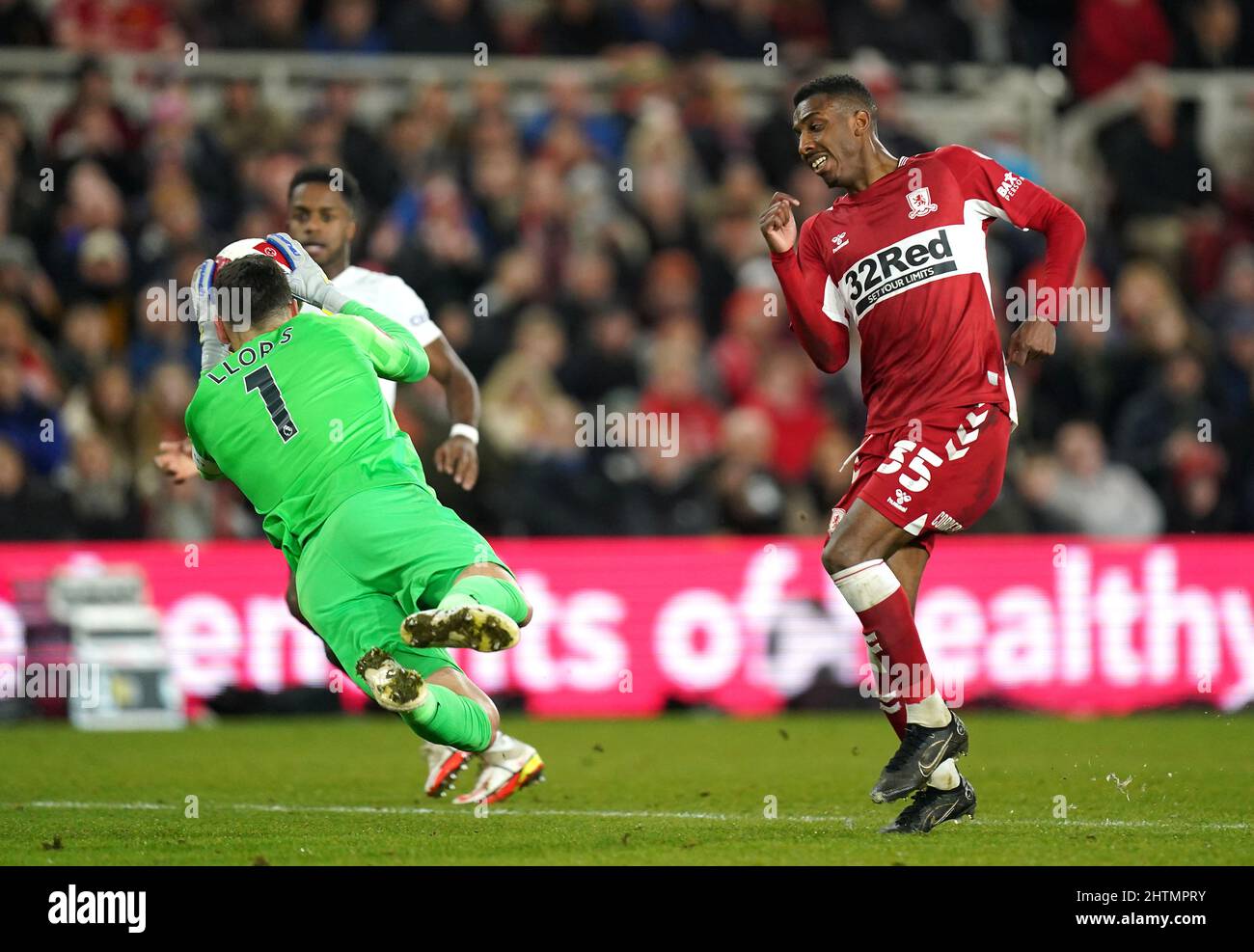 Middlesbrough's Matt Crooks (right) sees his shot saved by Tottenham ...