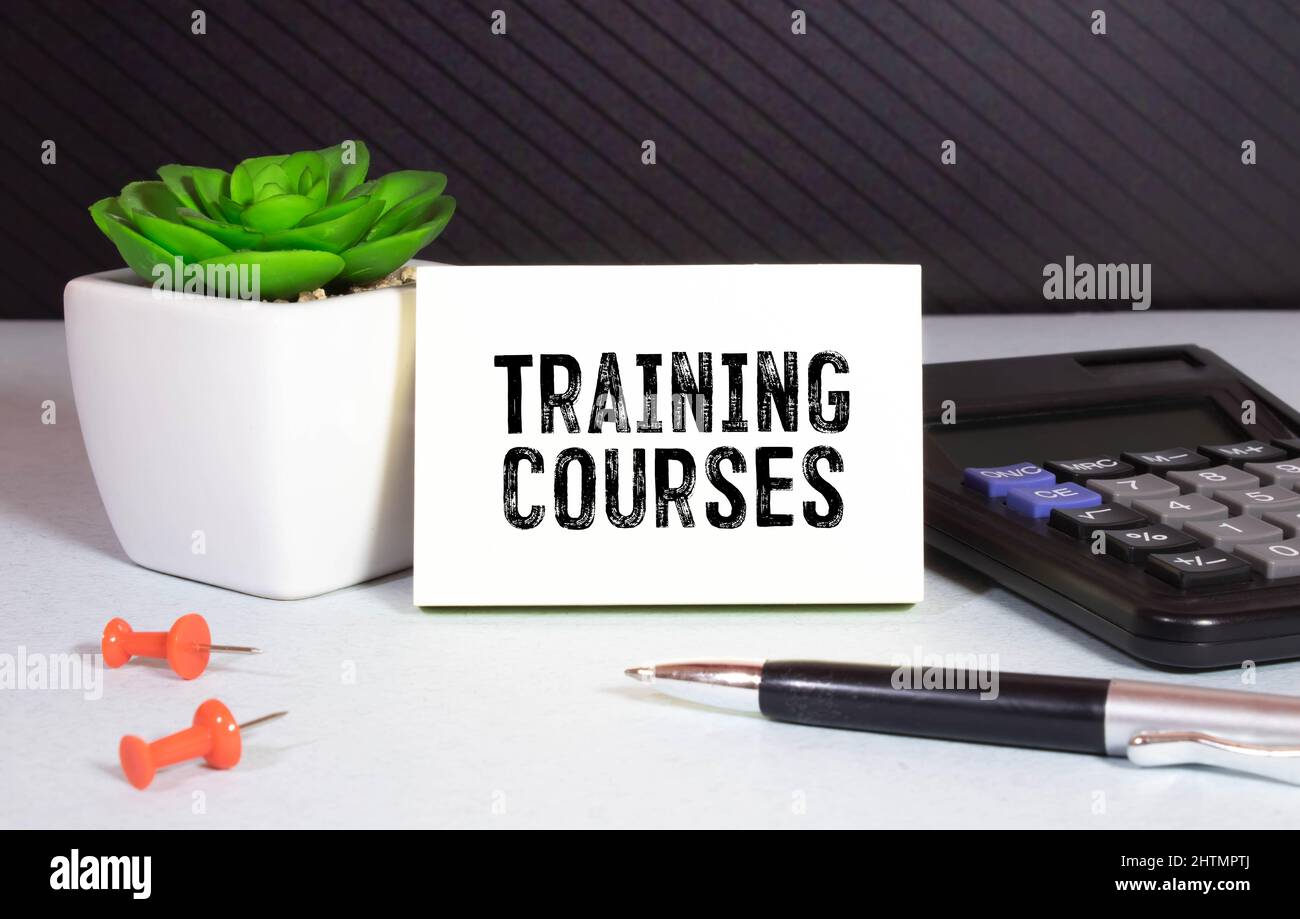 Training Courses, Business Concept. Stack of books and pencils on the ...