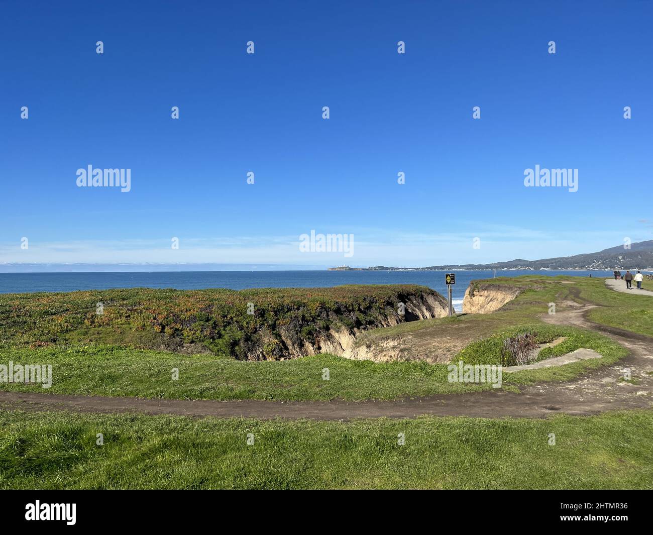 Eroded cliffs are visible near the Half Moon Bay Coastal trail, a ...