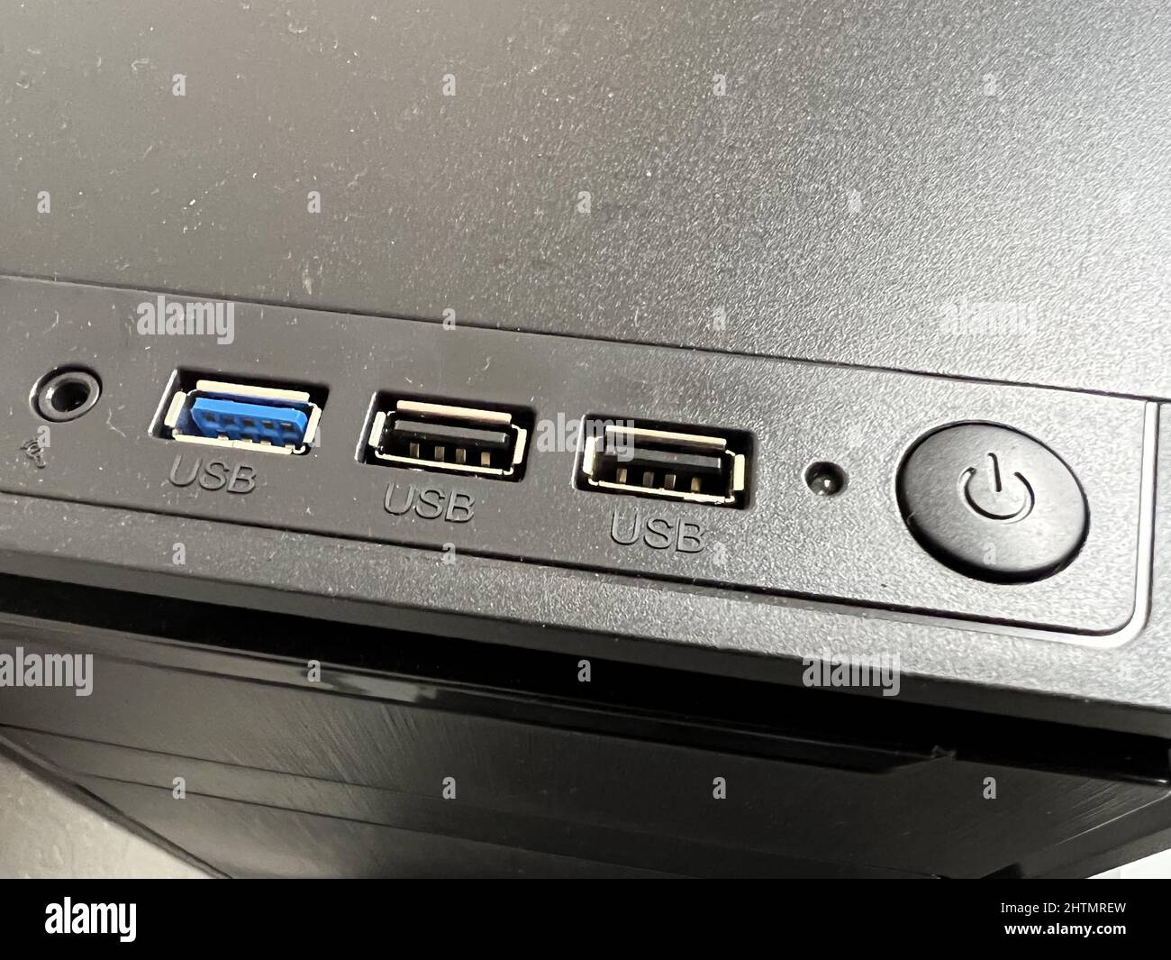 Several USB ports are visible atop a desktop computer case, Lafayette ...