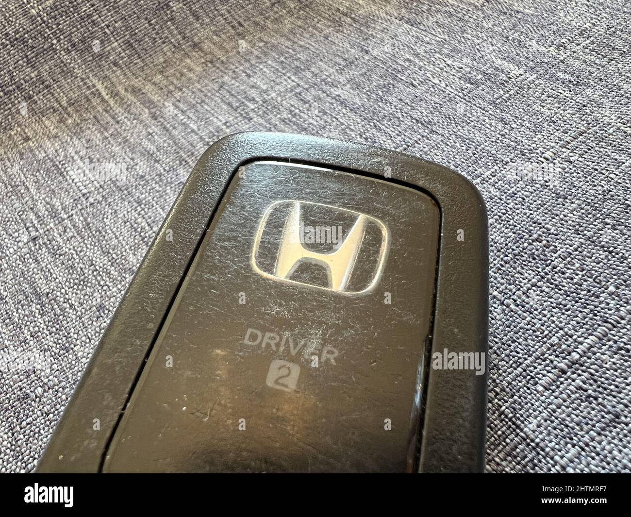 Logo for Honda on automotive non-contact keyfob on light gray surface ...