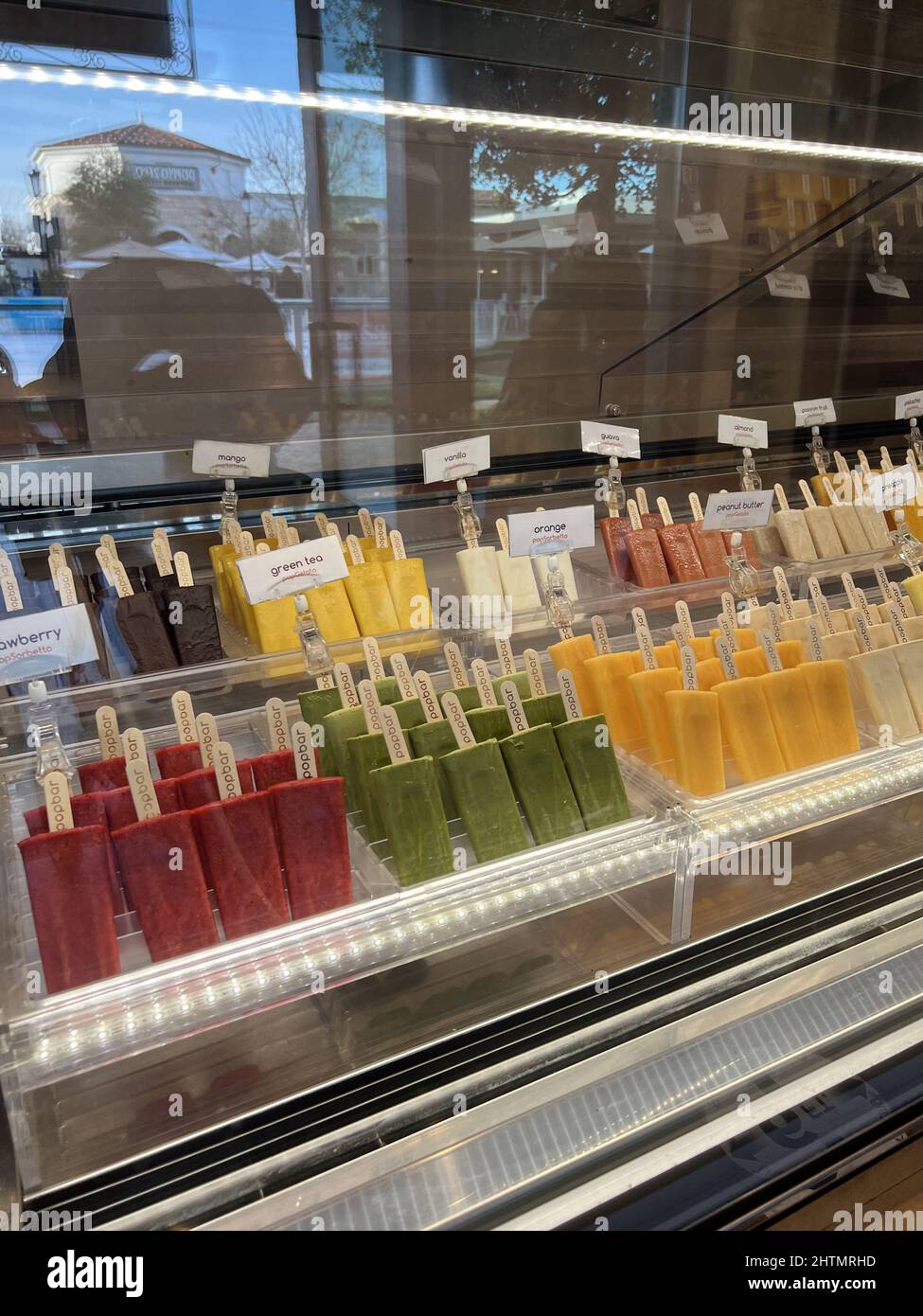 Handmade popsicles in display case at Popbar, an artisan popsicle store ...