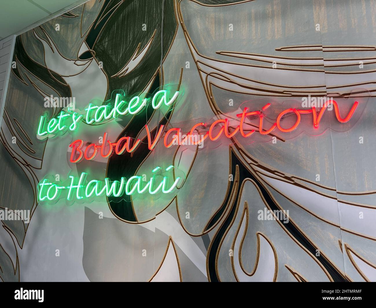 Neon sign reading Let's Take a Boba Vacation to Hawaii at Lilikoi Boba ...