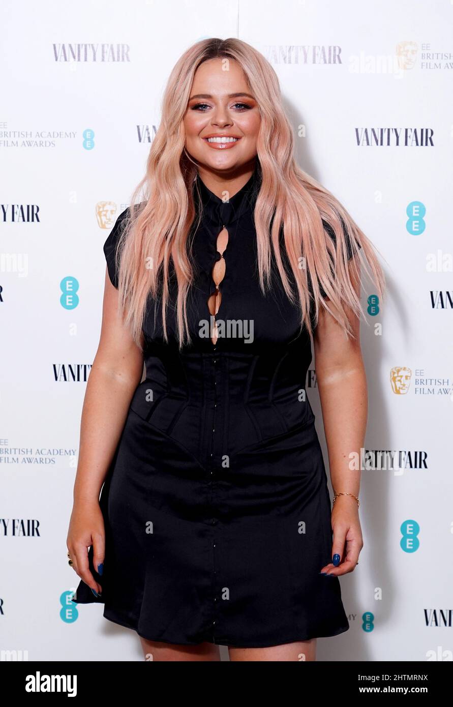 Emily Atack arrives at 180 Strand in London for the Vanity Fair EE ...