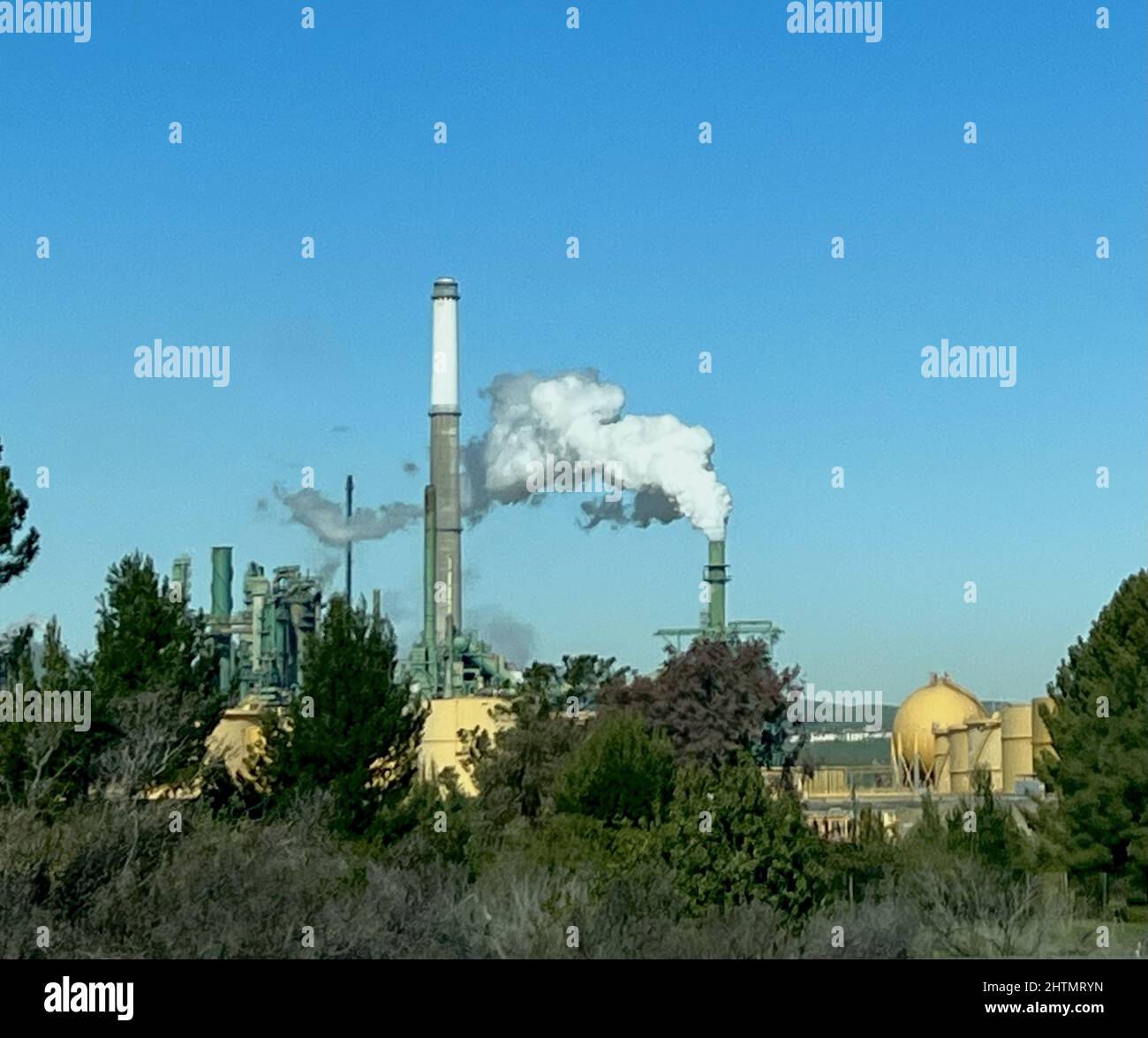 Equipment and chimneys are visible at Valery oil refinery in Benicia ...