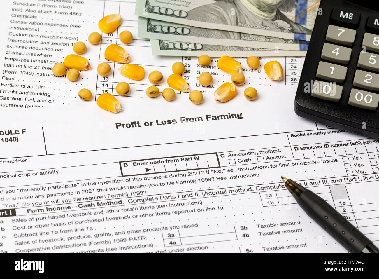 Soybeans, corn and farm tax form. Farming income, finances and ...