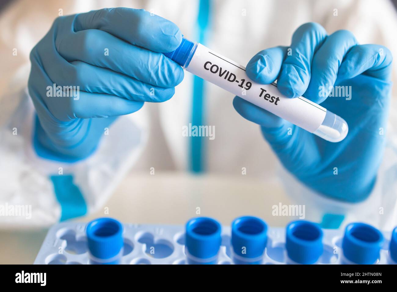 Process of coronavirus PCR antigen testing examination by nurse medic ...