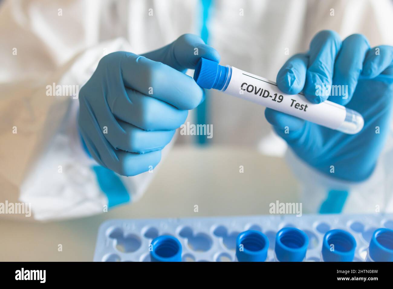 Process of coronavirus PCR antigen testing examination by nurse medic ...