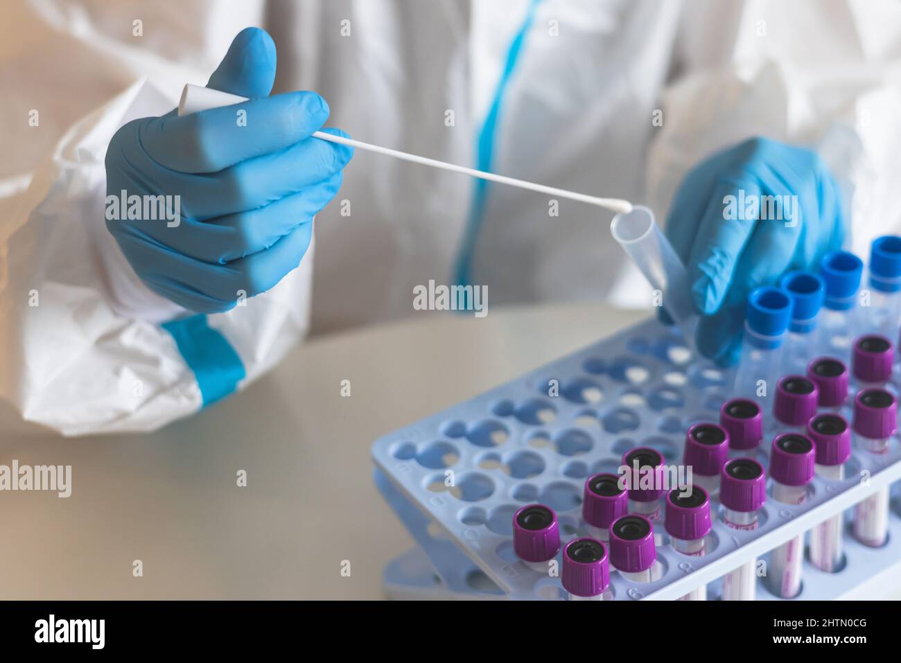 Process of coronavirus PCR antigen testing examination by nurse medic ...
