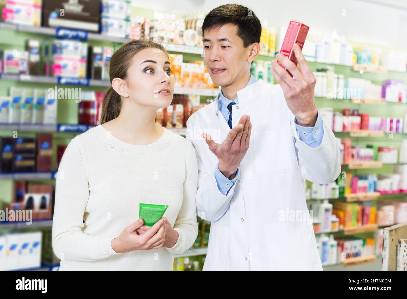 Healthcare specialist in apothecary patient hi-res stock photography ...