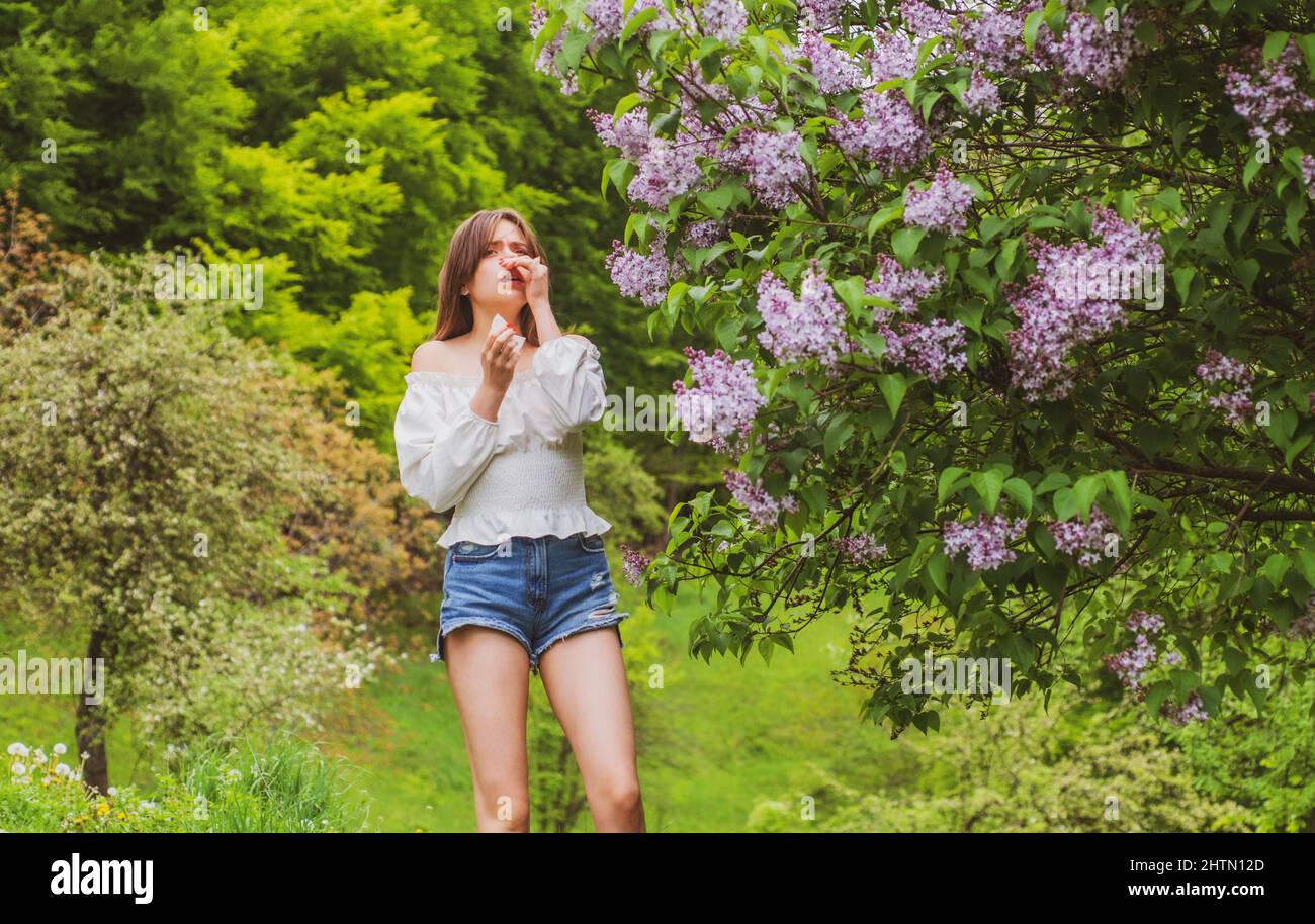 Spring allergy. Girl with nose sneezing. Allergic symptom concept ...