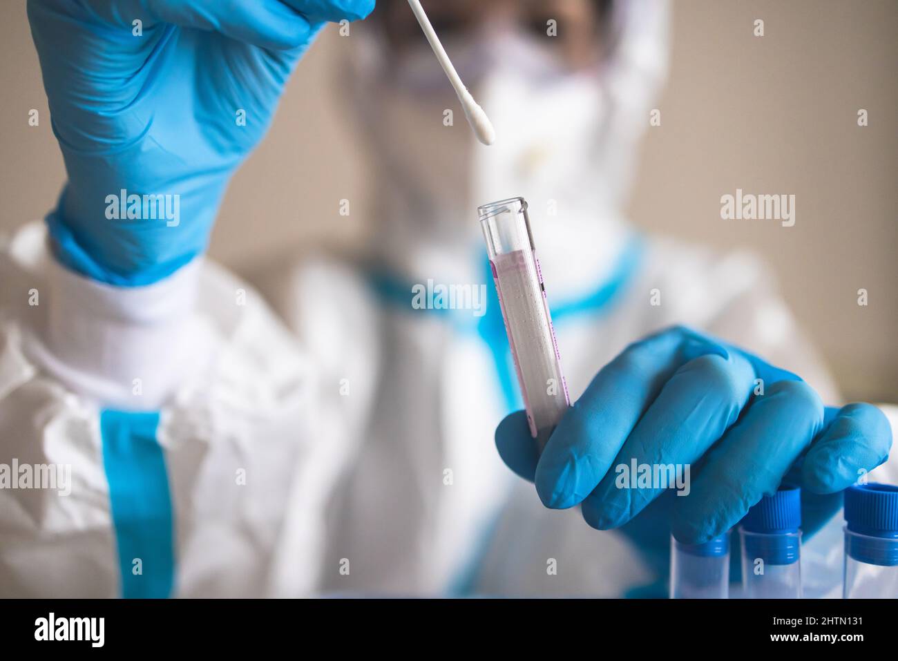 Process of coronavirus PCR antigen testing examination by nurse medic ...