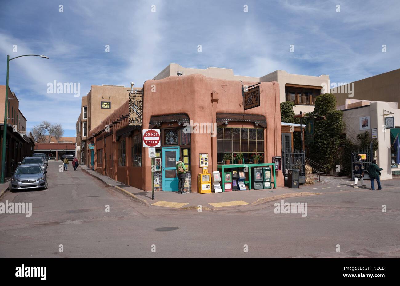 Visitors in Santa Fe, New Mexico, walk past Cafe Pasqual's, a popular ...