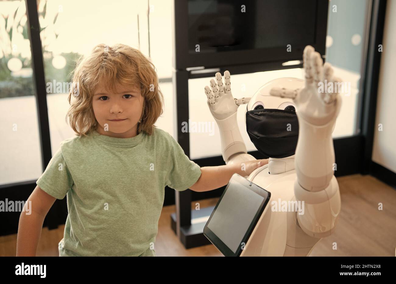 smart boy child communicate with robot assistant technology for modern ...